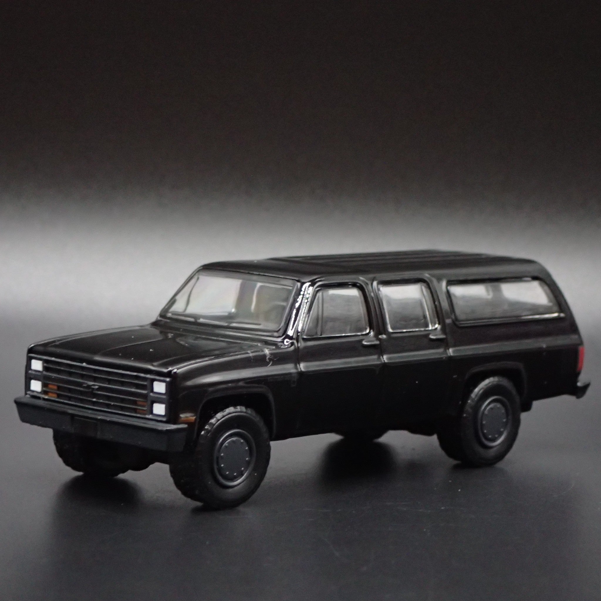 1973-1991 CHEVY CHEVROLET SUBURBAN K20 DELUXE BLACK 1:64 SCALE DIECAST – Burning Rubber Toy Company