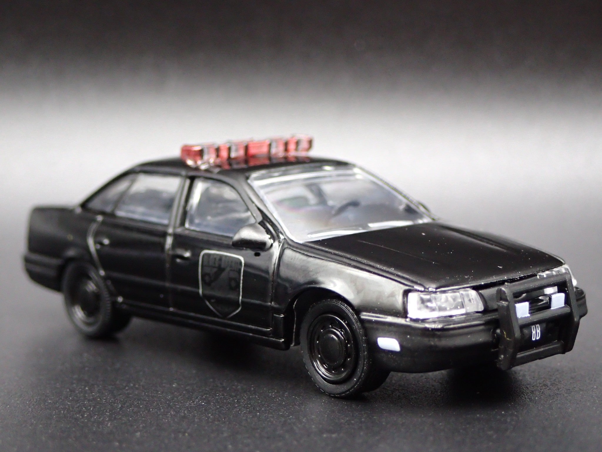1986-1991 FORD TAURUS POLICE CAR 4 FOUR DOOR BLACK 1:64 SCALE DIECAST ...